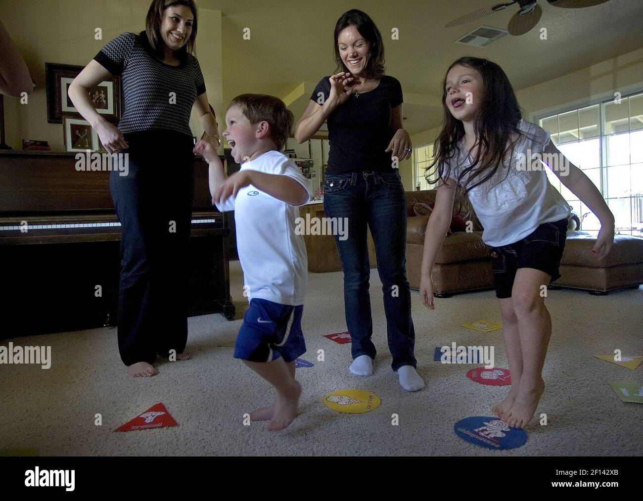 Monica Gomez, a behavior consultant from learning solutions, plays a ...