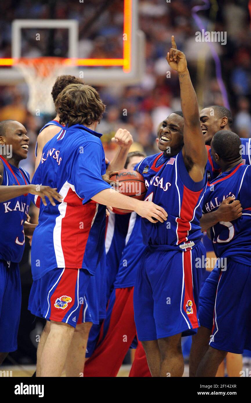 Kansas' Sherron Collins (4) celebrates with teammates after defeating ...