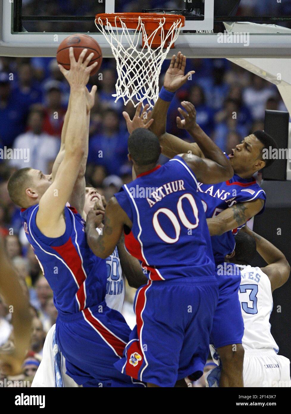 Kansas center Cole Aldrich pulls down a rebound against North Carolina ...