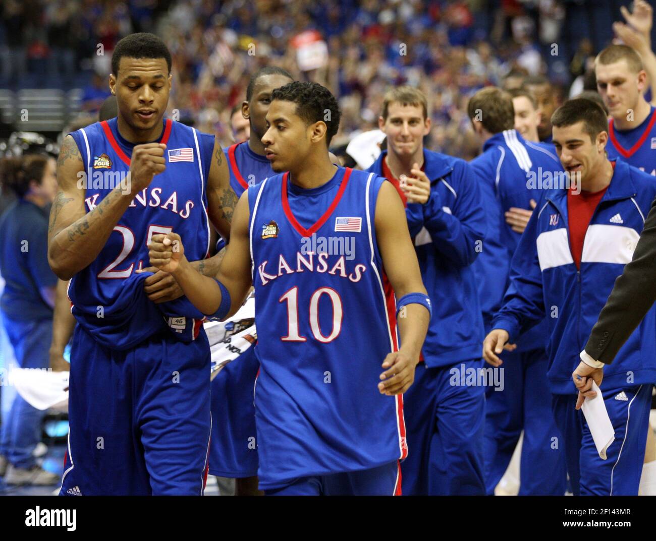 Kansas' Brandon Rush (25) and Jeremy Case (10) celebrate the Jayhawks ...