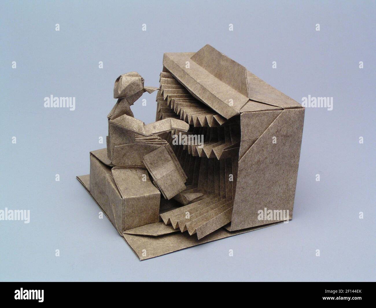 Robert J. Lang, origami artist and speaker at TED Conference 2008, displays his work, in ...