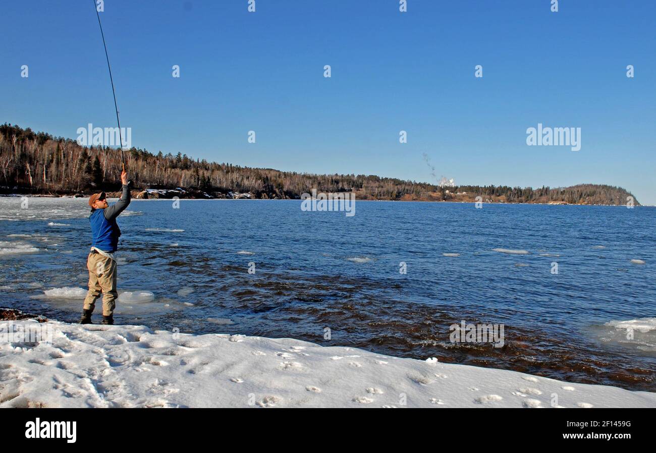 Tim Pearson, of Silver Bay, Minnesota, on the North Shore, casts a two ...
