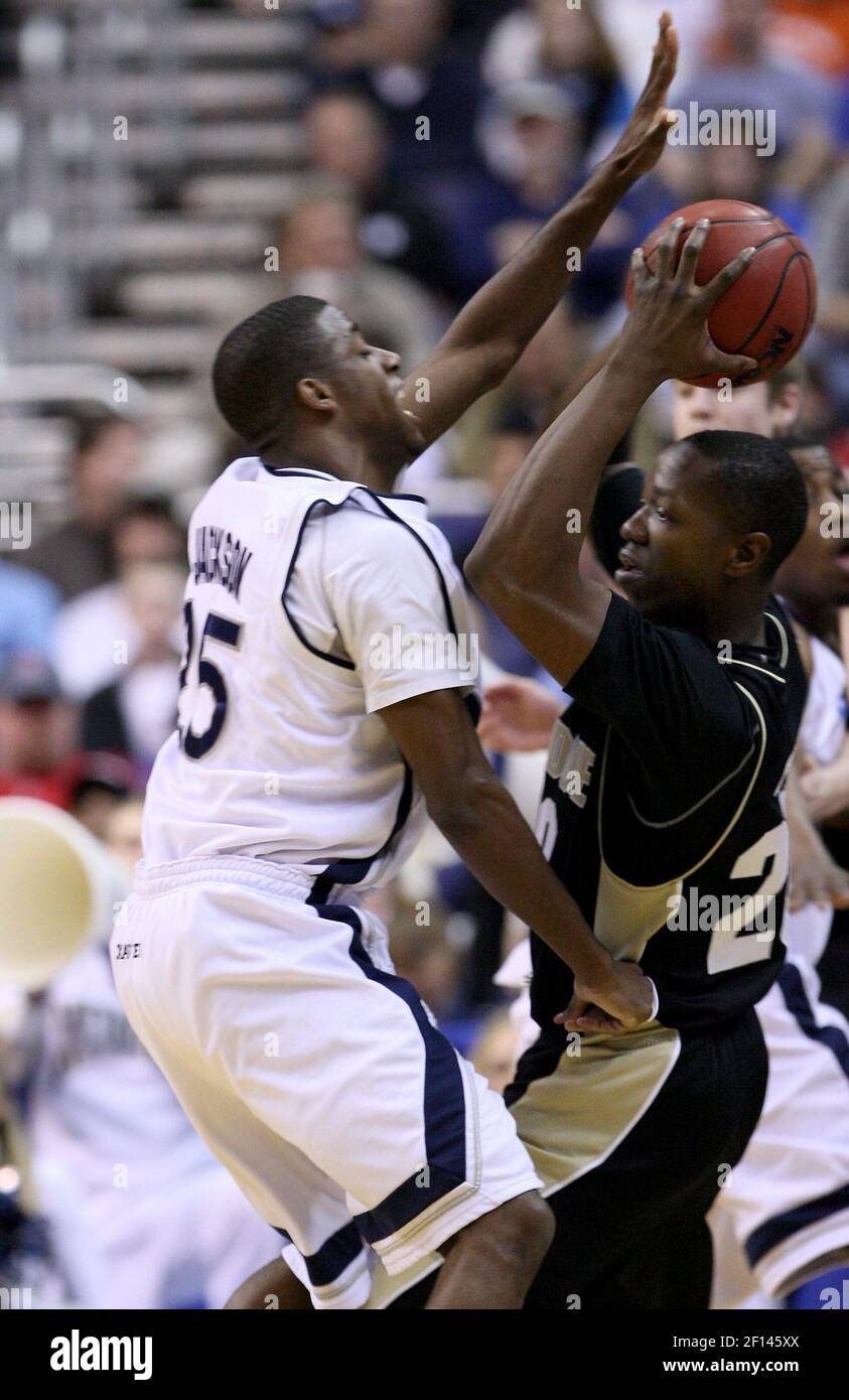 Purdue's Marcus Green looks to pass as Xavier's Dante Jackson defends ...