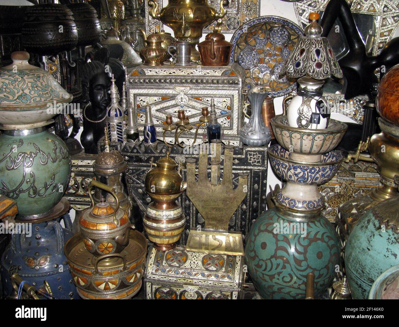 In the souk, a typically crammed antiques stall. (Photo by Jackie Bolin ...