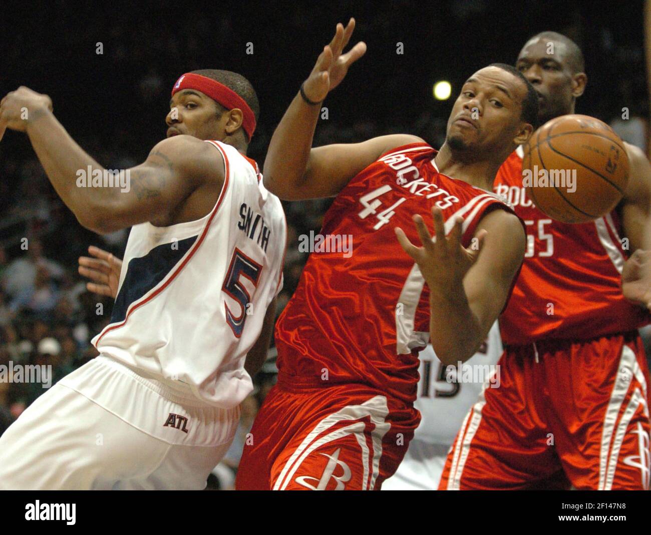 Atlanta Hawks' Josh Smith (left) loses the ball while Houston Rockets ...
