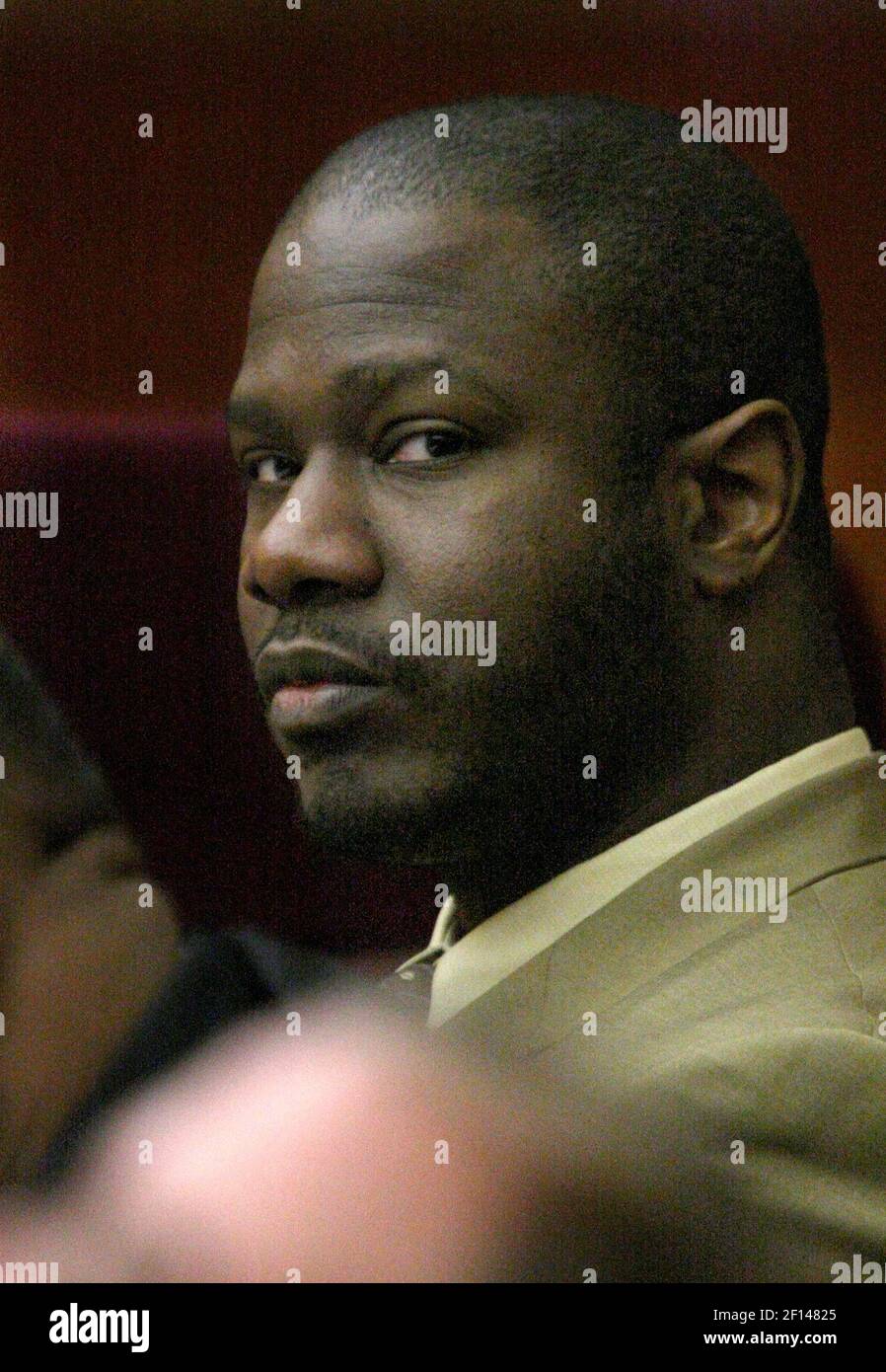 Brian Nichols glances towards the prosecution during a hearing in ...