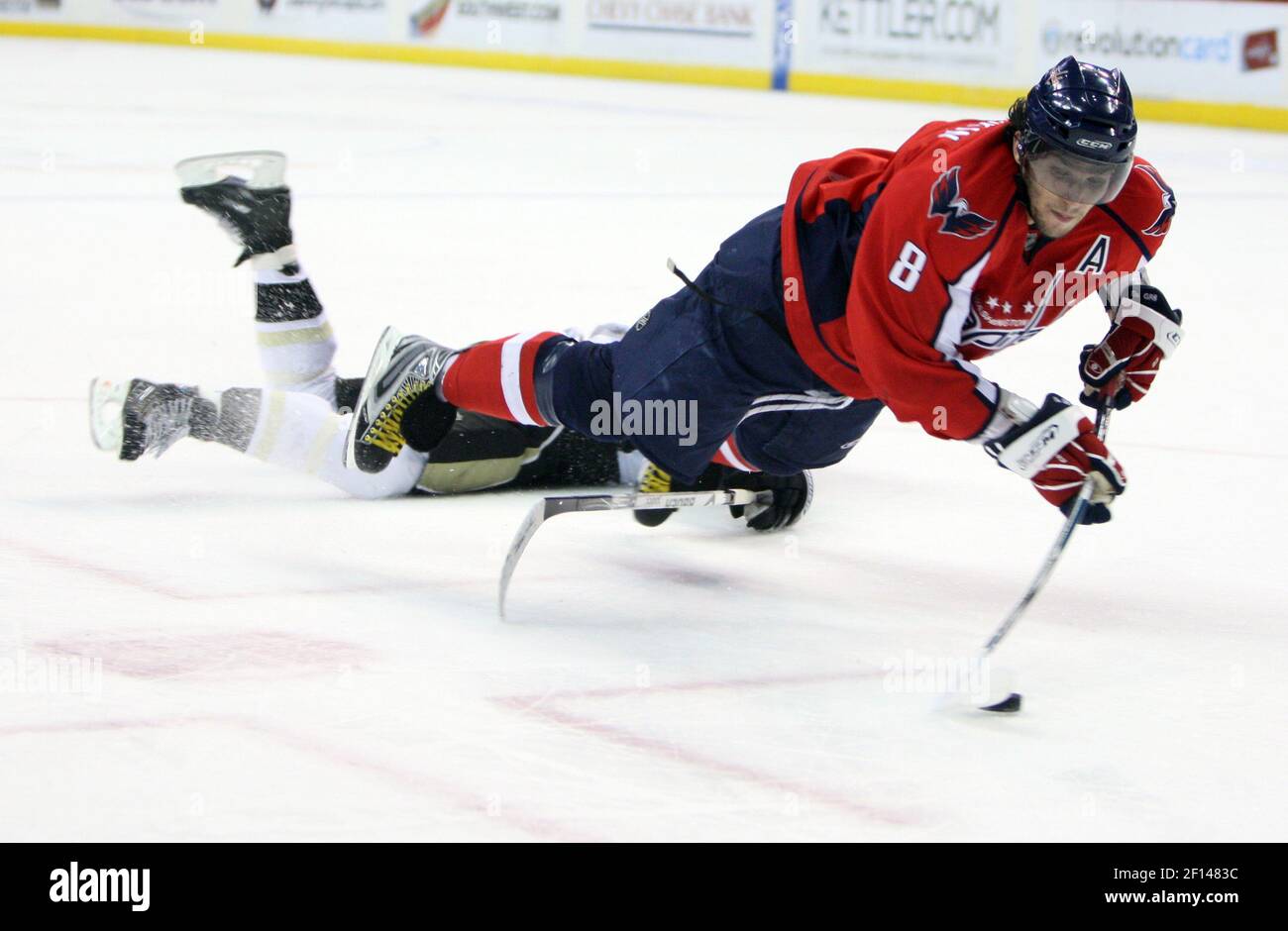 The Washington Capitals' Alex Ovechkin (8) goes flying as the ...