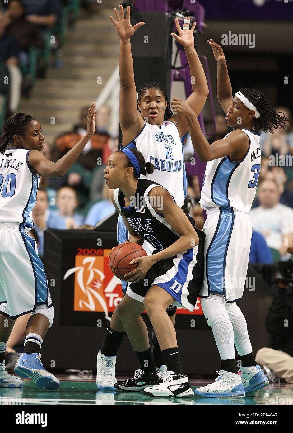 North Carolina defenders LaToya Pringle (30), Erlana Larkins (2), and ...