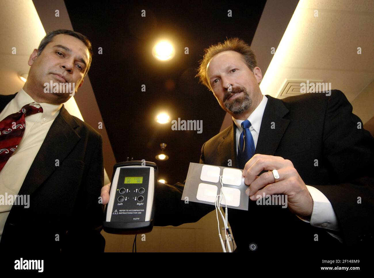 Dr. Darrell DeMello, left, President of ScyFIX and Thomas Harold ...