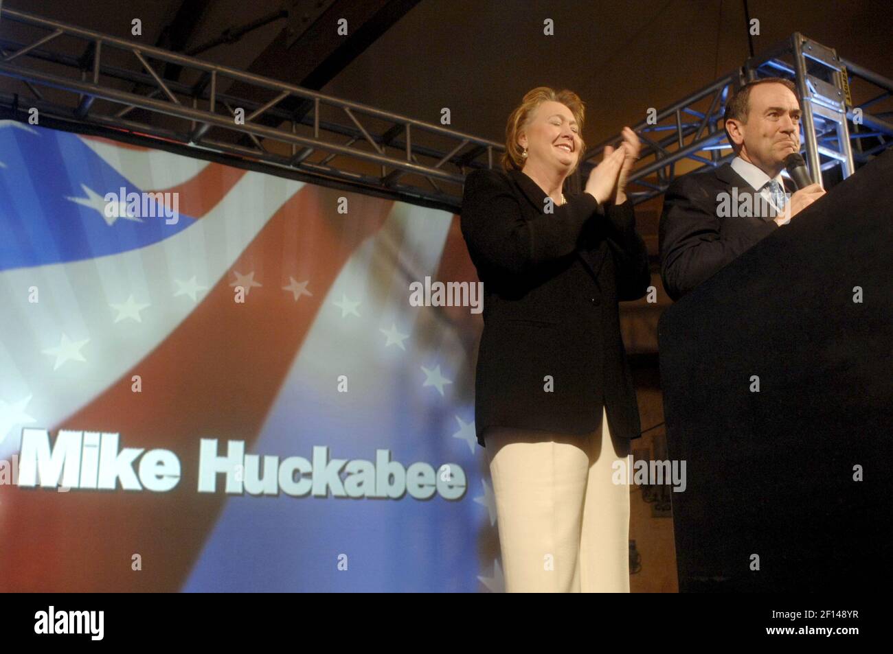 Republican presidential candidate Mike Huckabee with wife, Janet, by ...