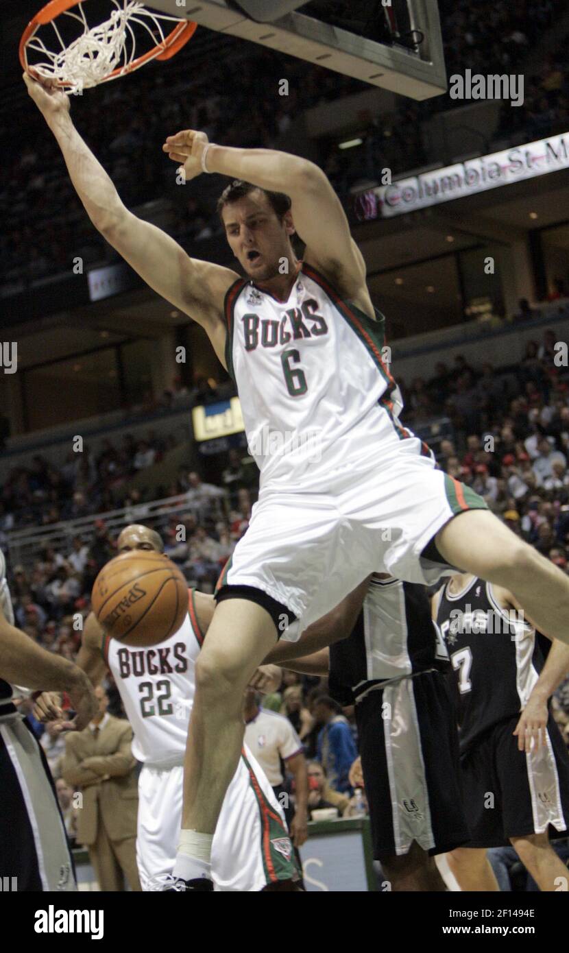 The Milwaukee Bucks' Andrew Bogut dunks the ball during first half action against the San ...