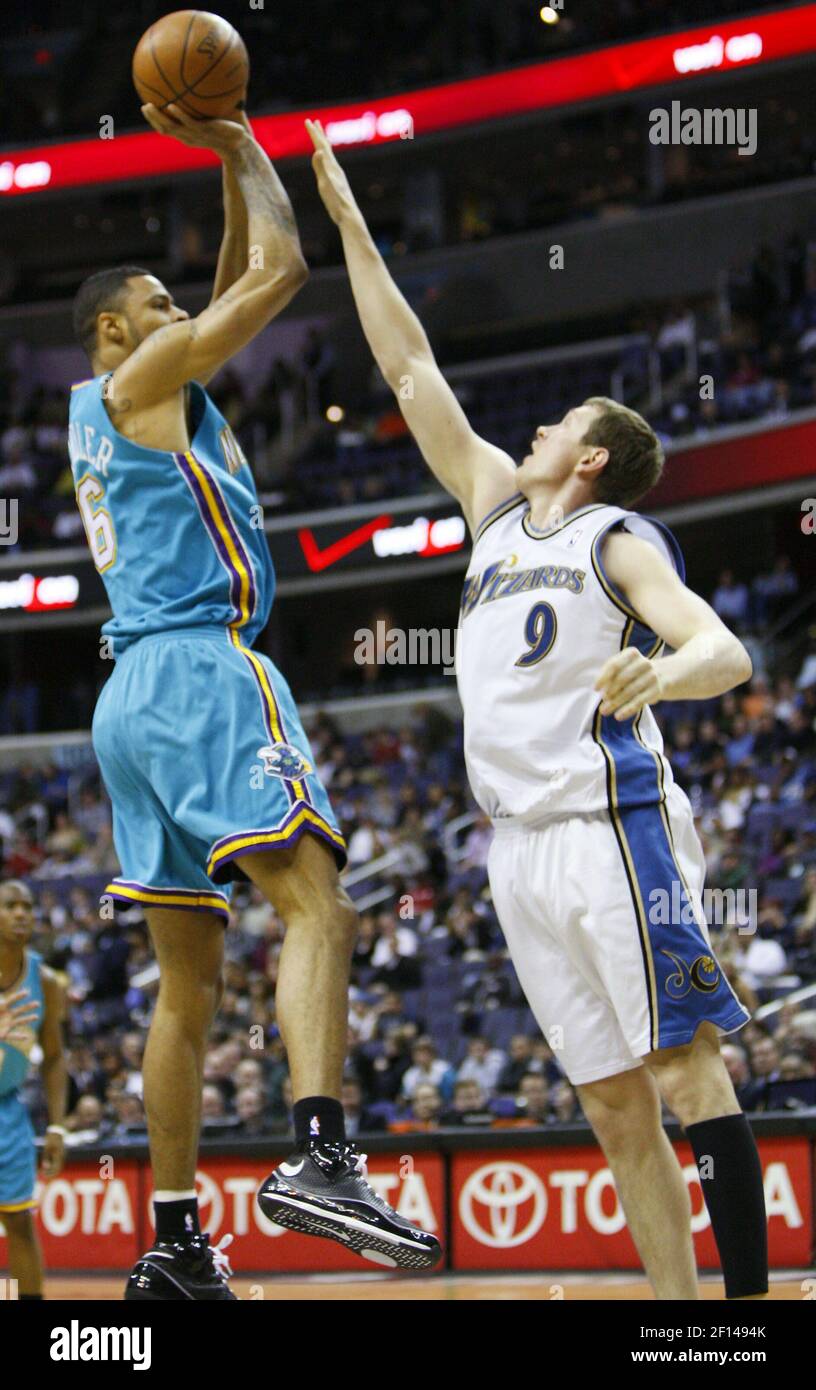 The New Orleans Hornets' Tyson Chandler (6) puts up a shot against ...