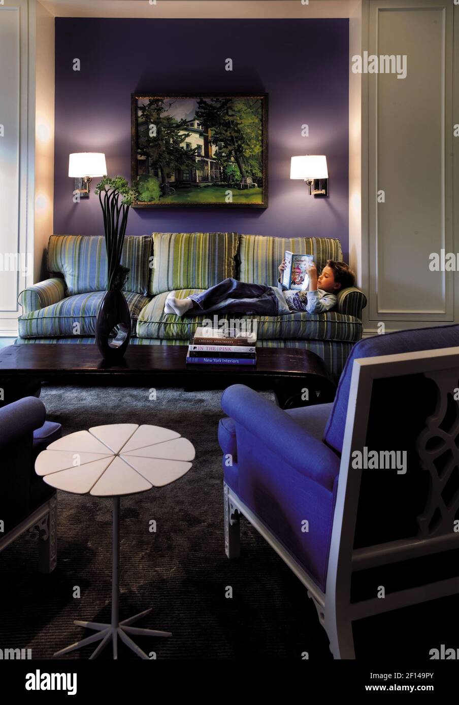 In this photograph, an upstairs TV room that Joan Craig designed is ...