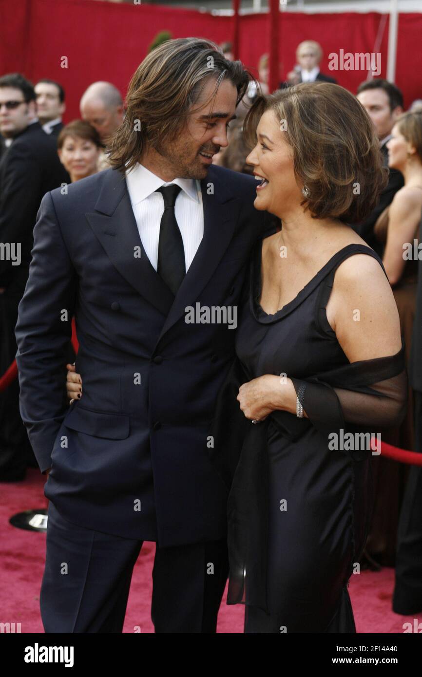 Colin Farrell arrives with a guest during the 80th Academy Awards at ...