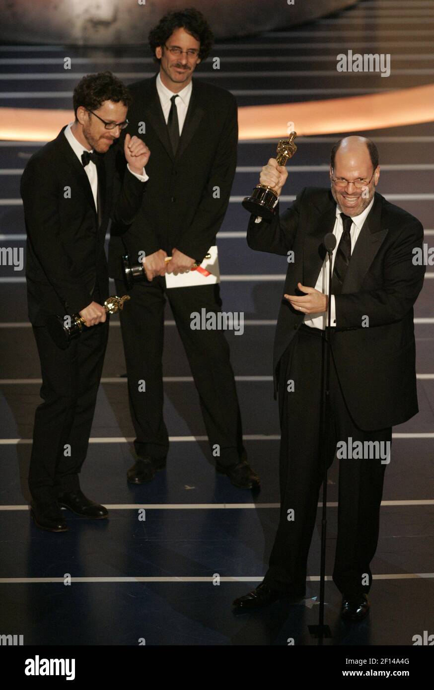 Ethan Coen (left), Joel Coen (center) and producer Scott Rudin (right ...
