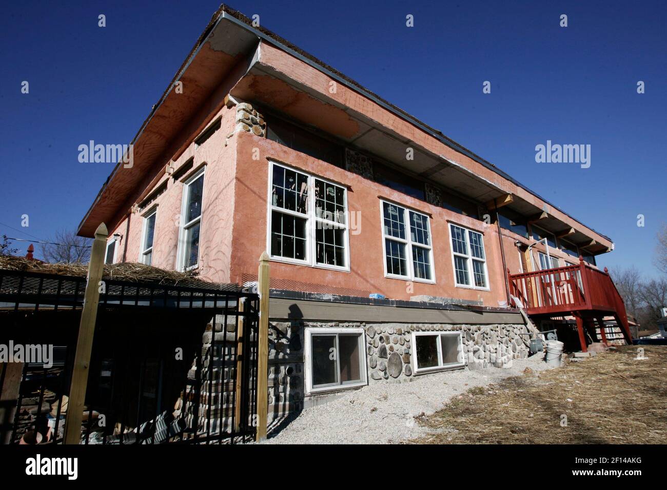 In this photograph, the hybrid home of John Schulz is being built with ...