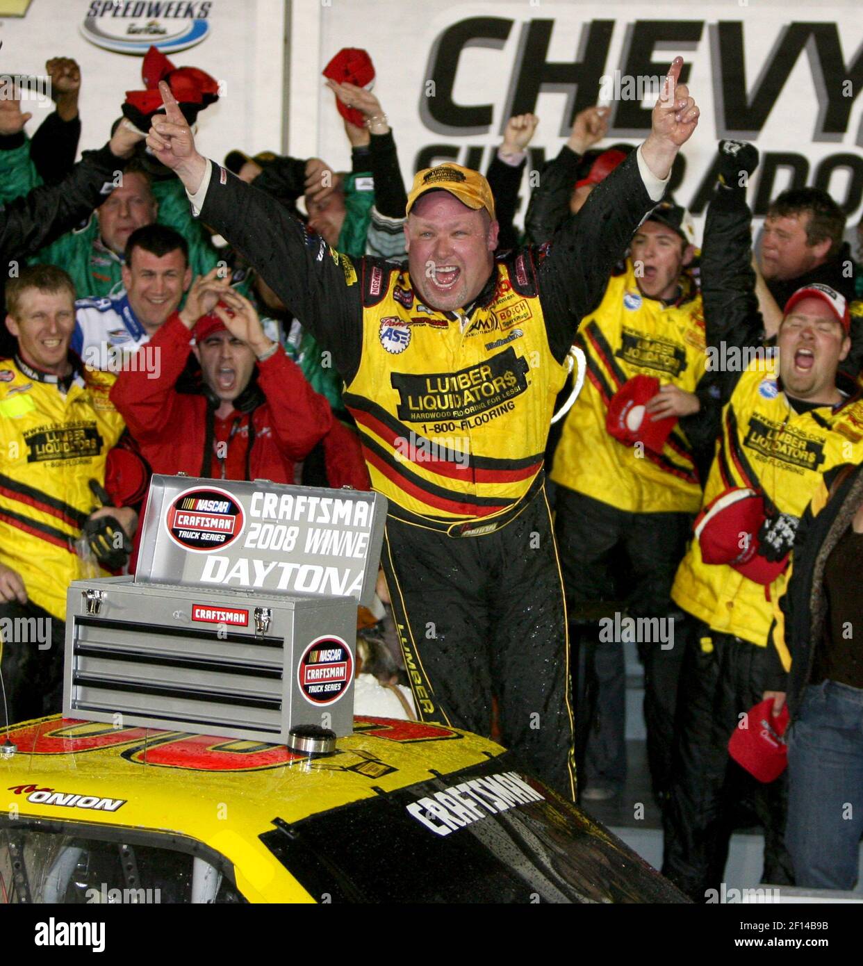 Todd Bodine celebrates in Victory Lane after winning the Chevy ...
