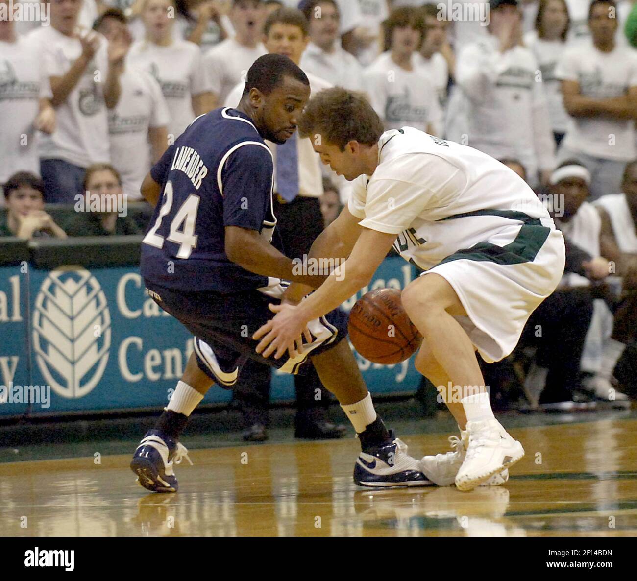 Charlotte's Michael Gerrity (1) strips the ball from Xavier's Drew ...