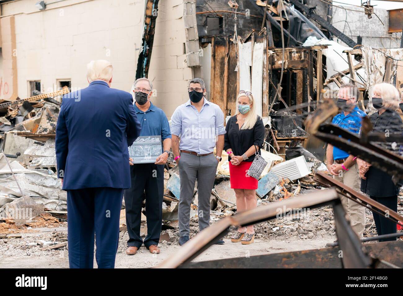 President Donald Trump meets John Rode and his family members Tuesday ...