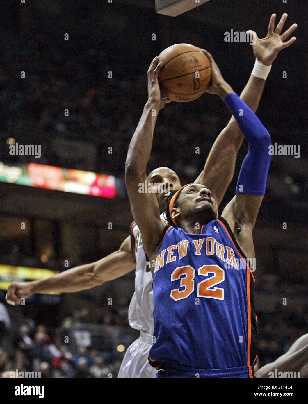 The New York Knicks' Renaldo Balkman (32) goes for a shot in front of ...