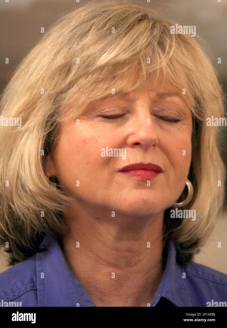 Patty Fansler, the manager of the St. Agnes Gift Shop, takes part in a ...