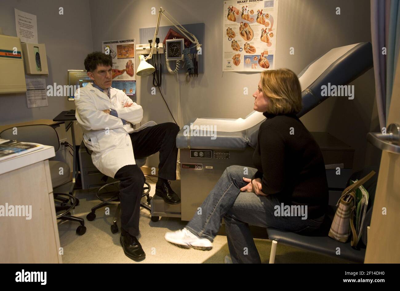 Dan Rader, a University of Pennsylvania cardiologist, counsels patient ...