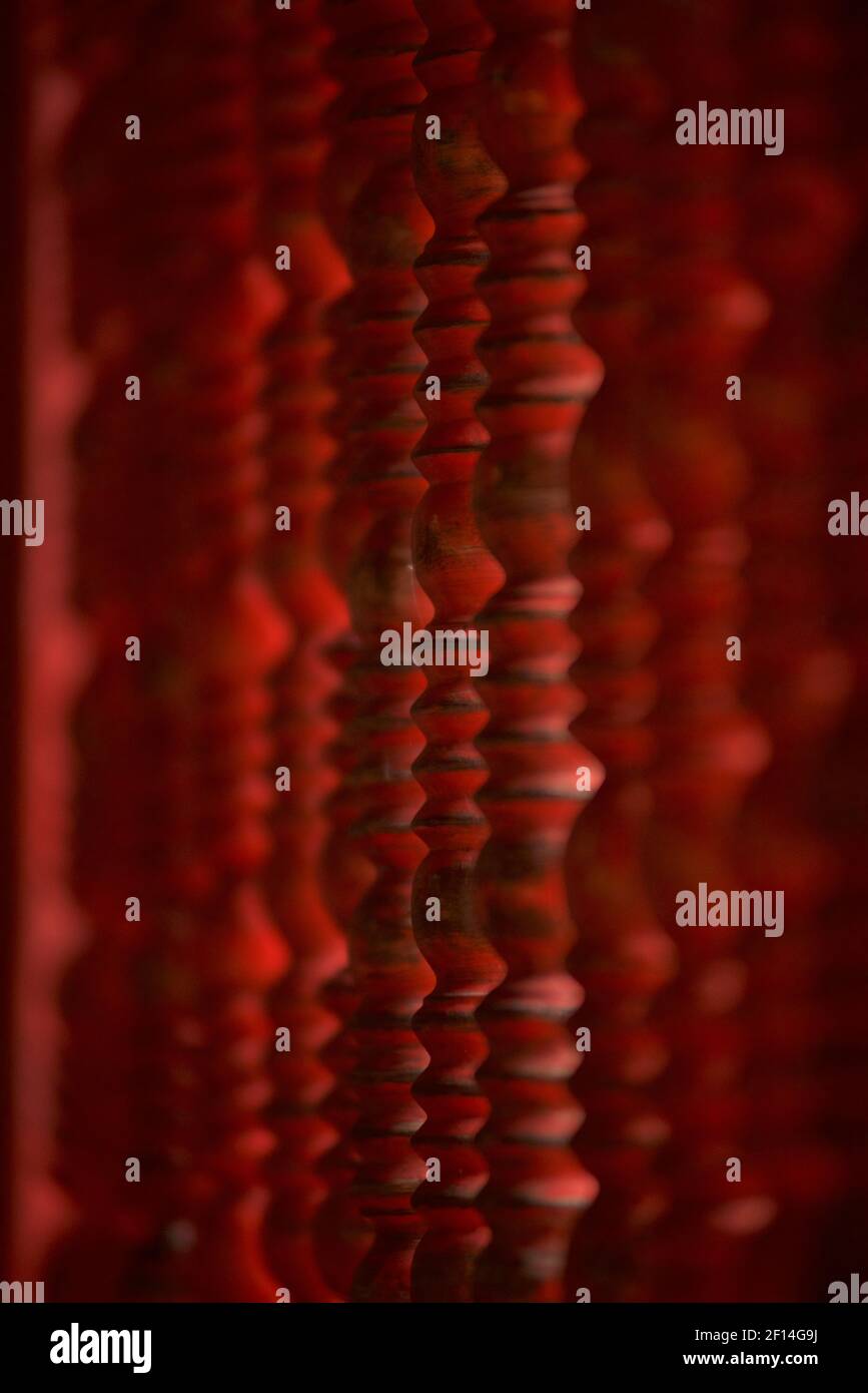 Turned wooden dowels screen the window openings of the Temple of ...