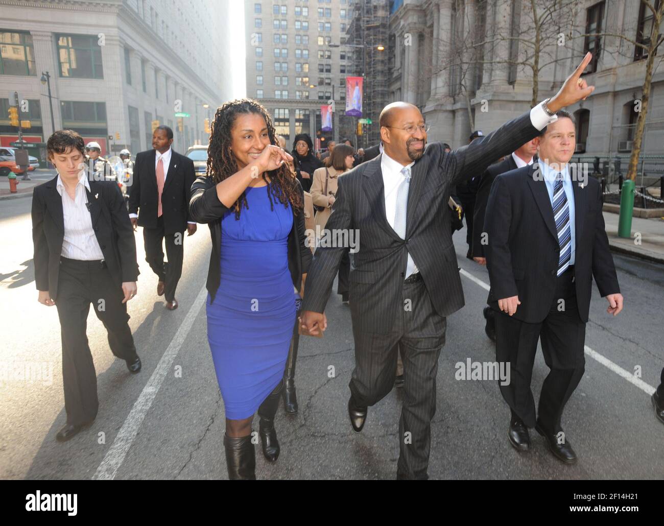 Waving to well-wishers, new Philadelphia Mayor Michael Nutter, center ...