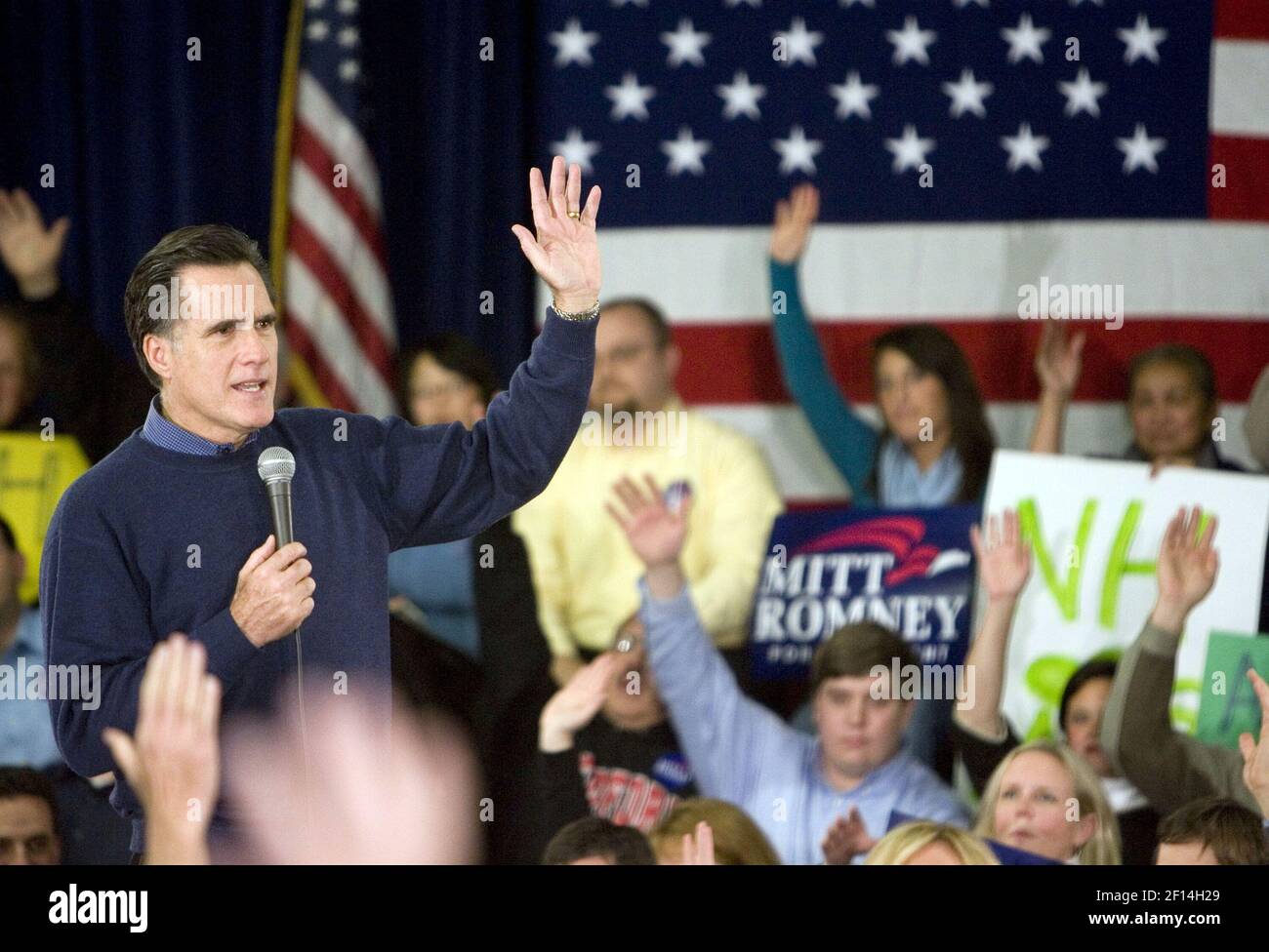 Republican presidential candidate Mitt Romney conducts one of his "Ask ...