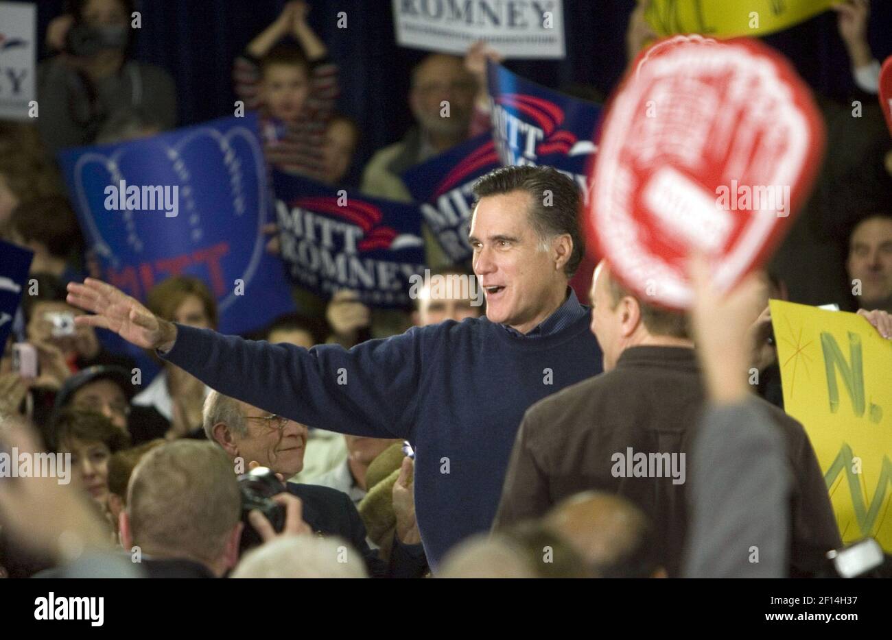 Republican presidential candidate Mitt Romney conducts one of his "Ask ...