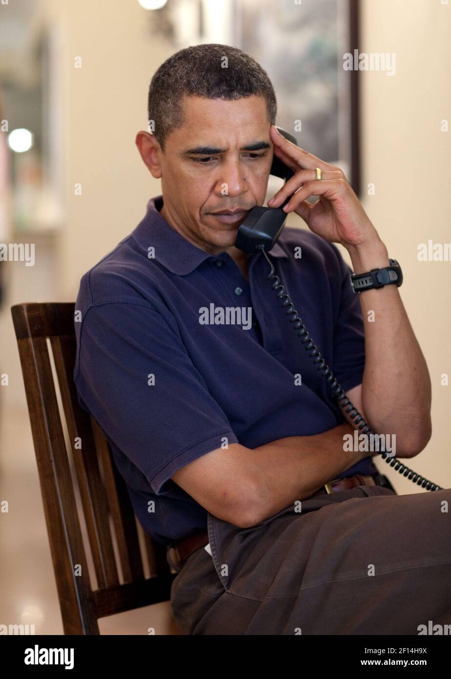 President obama talking on telephone hi-res stock photography and ...
