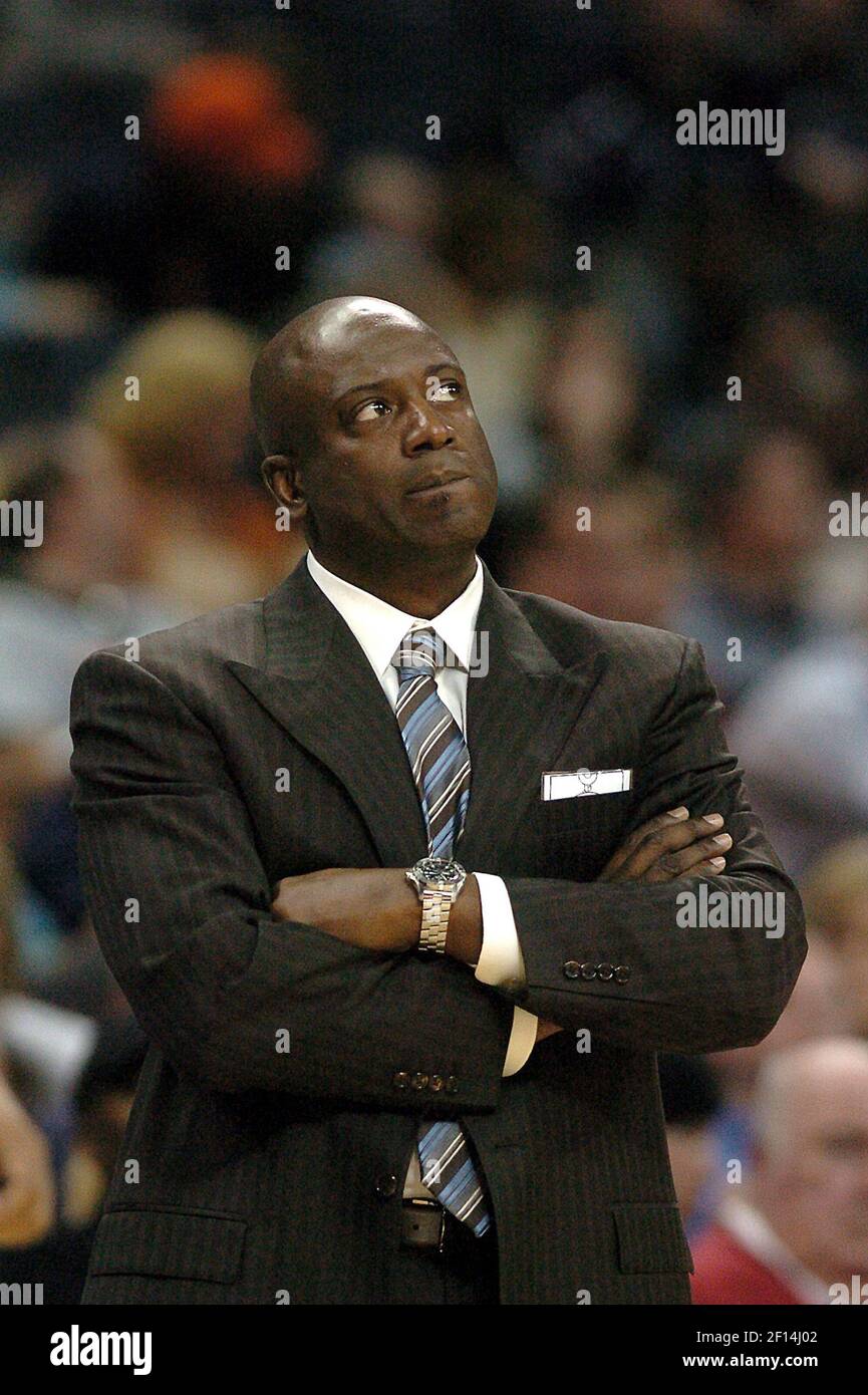 Charlotte Bobcats head coach Sam Vincent stares at the scoreboard as ...