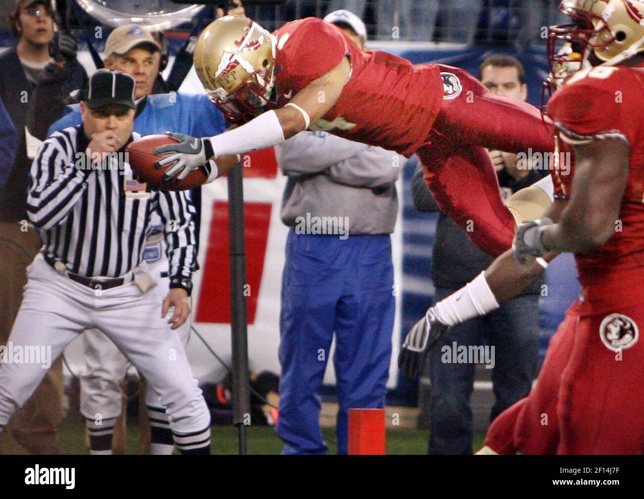 Florida State cornerback Tony Carter leaps into the end zone after ...