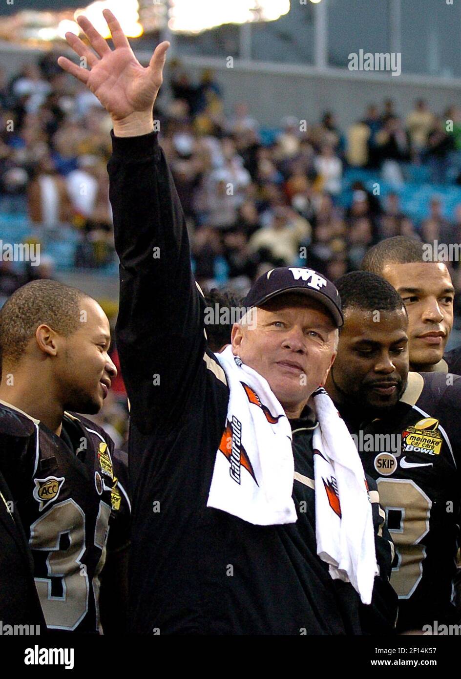 Wake Forest Demon Deacons head coach Jim Grobe acknowledges the cheers ...