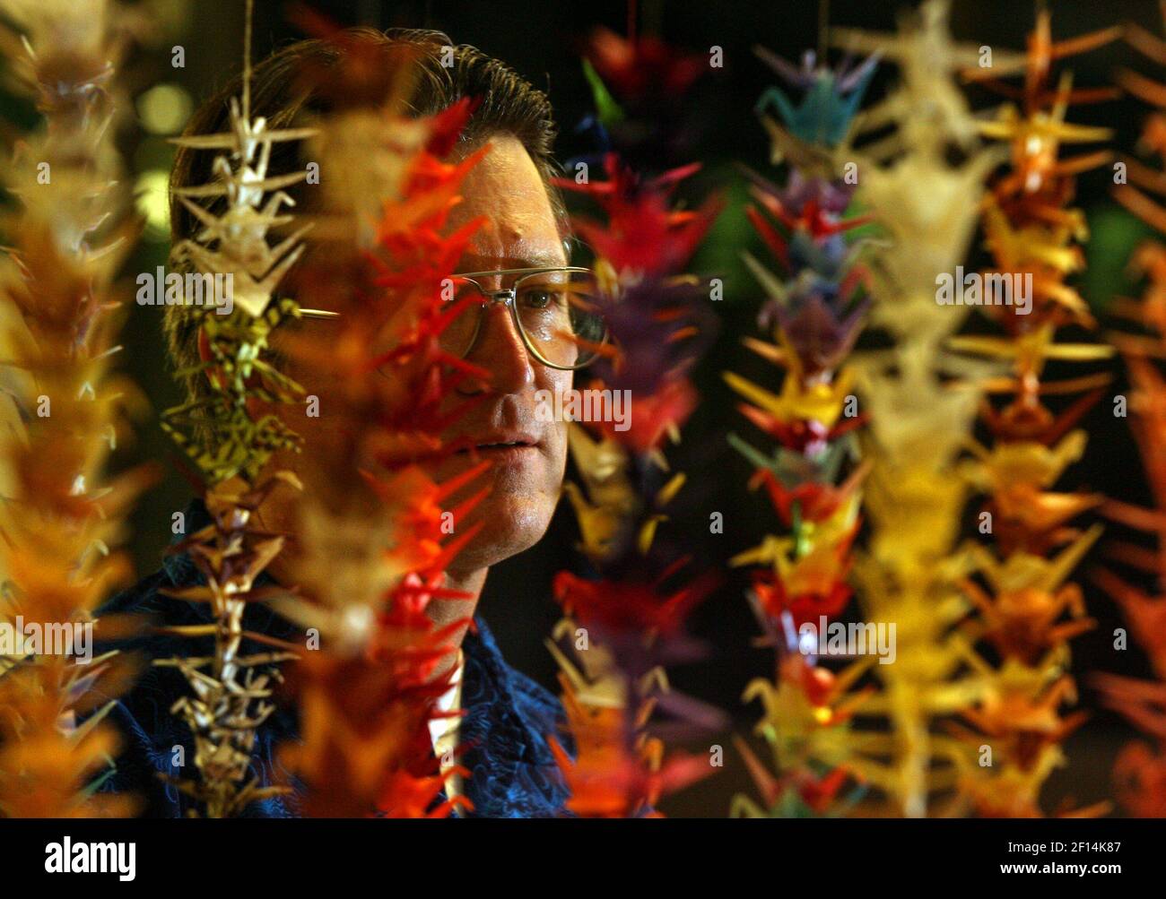 Ray Thomas, of Hanford, looks over a memorial to the victims of the ...