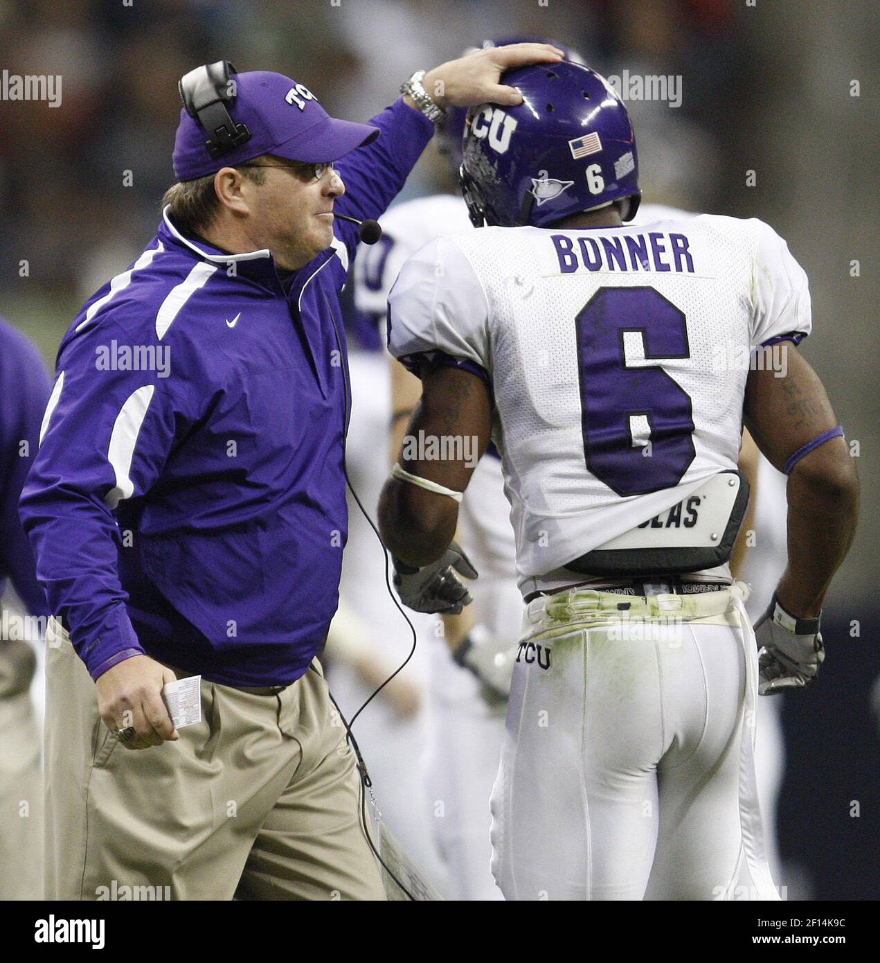 Texas Christian head coach Gary Patterson congratulates Brian Bonner ...