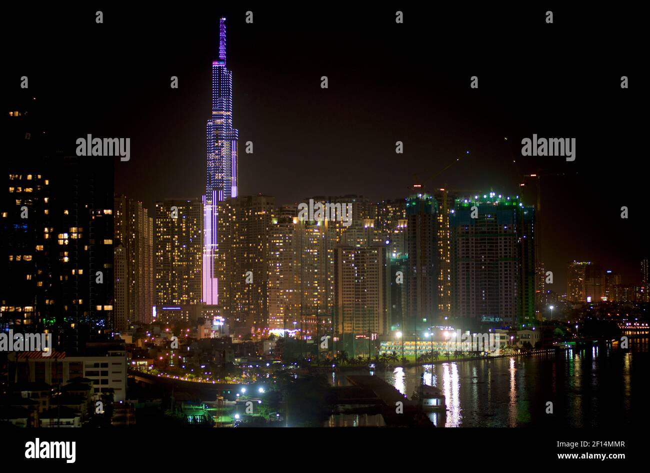 Ho Chi Minh city illuminated at night ... Landmark 81 Skyscraper. Tan ...