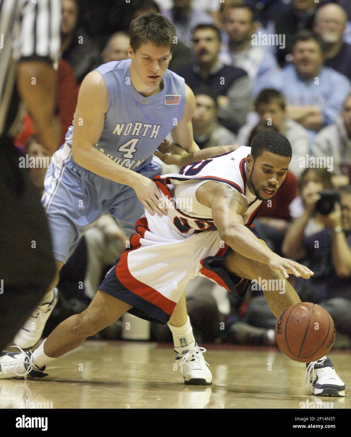 Pennsylvania's Remy Cofield steals the ball from North Carolina's Bobby ...