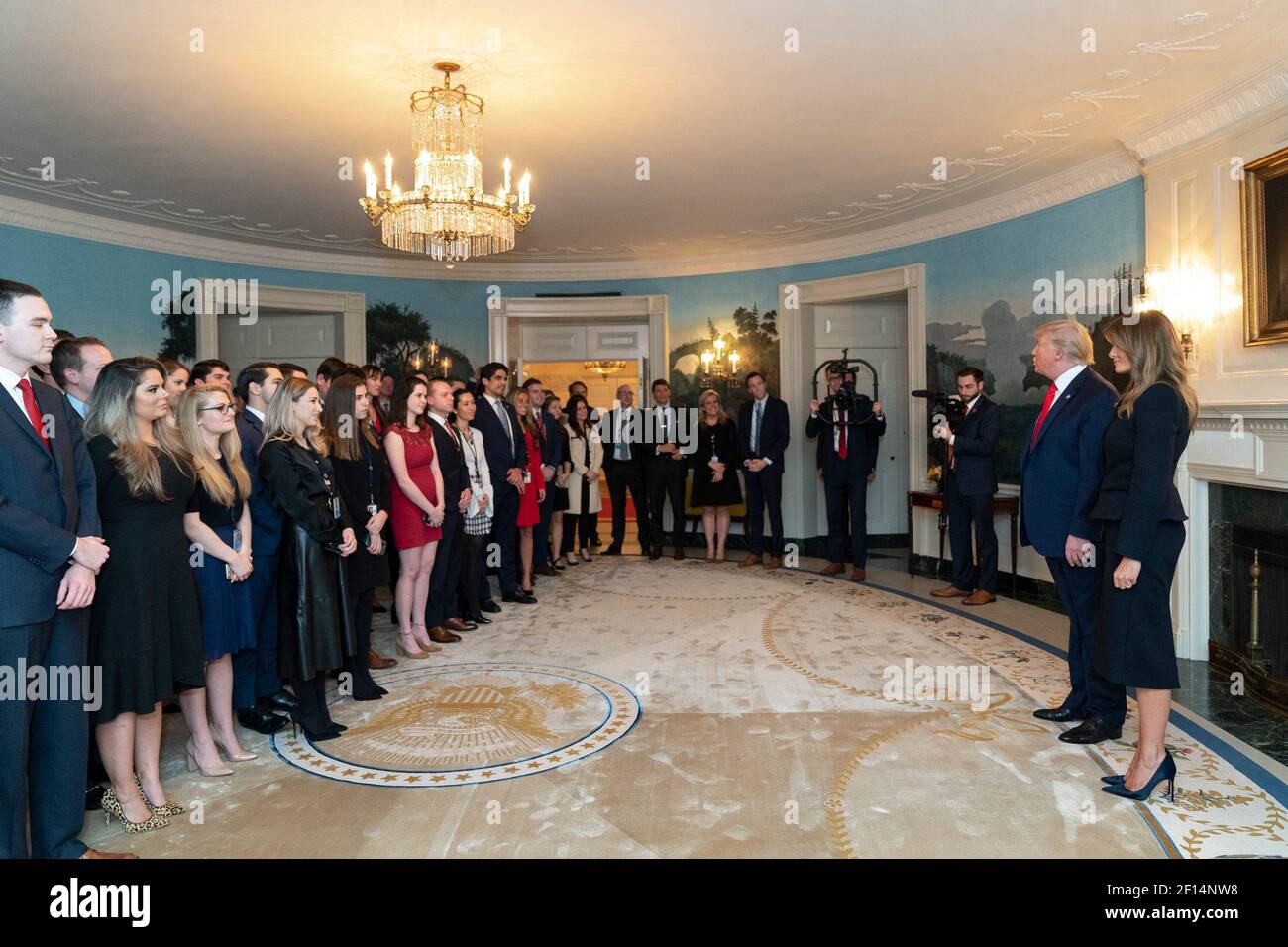 President Donald Trump and First Lady Melania Trump are greeted by ...