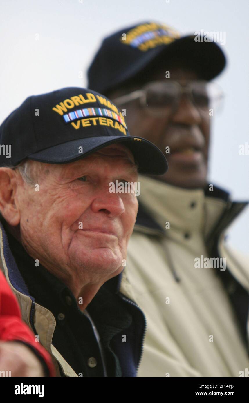World War II veterans Frank Dunlap, left, and Chappelle Johnson stand ...