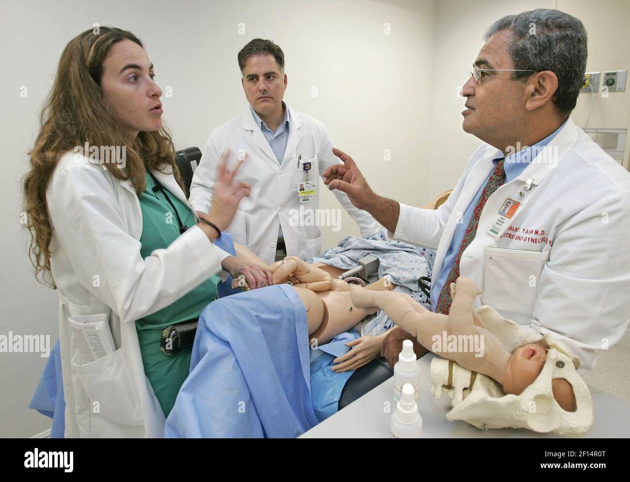 Resident Clara Croce discusses birthing procedures with Dr. Salih Yasin ...
