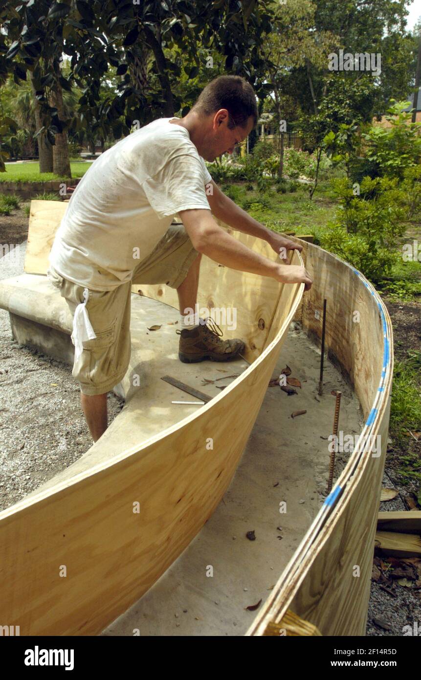 Contractor, Andy Adams, makes a concrete bench for the historic Seibel ...