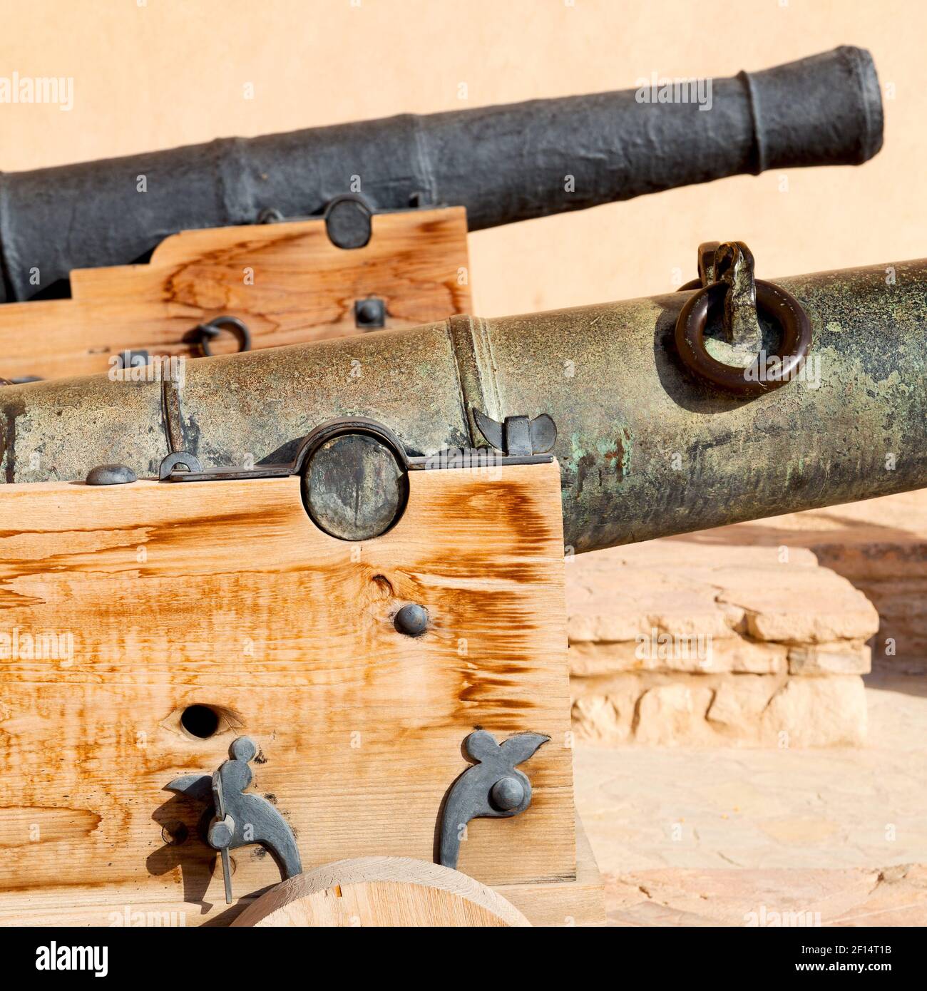 In oman muscat the old castle and cannon near the wall Stock Photo - Alamy