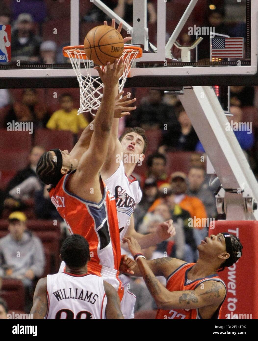 Philadelphia 76ers' Jason Smith tries to block a shot by Charlotte ...