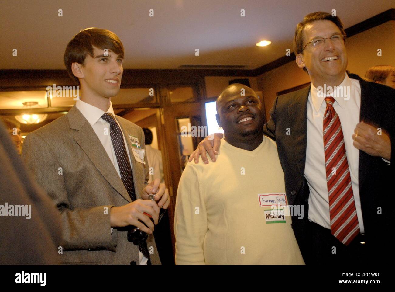 Charlotte Mayor Pat McCrory celebrates with Furman Smith (left) and ...