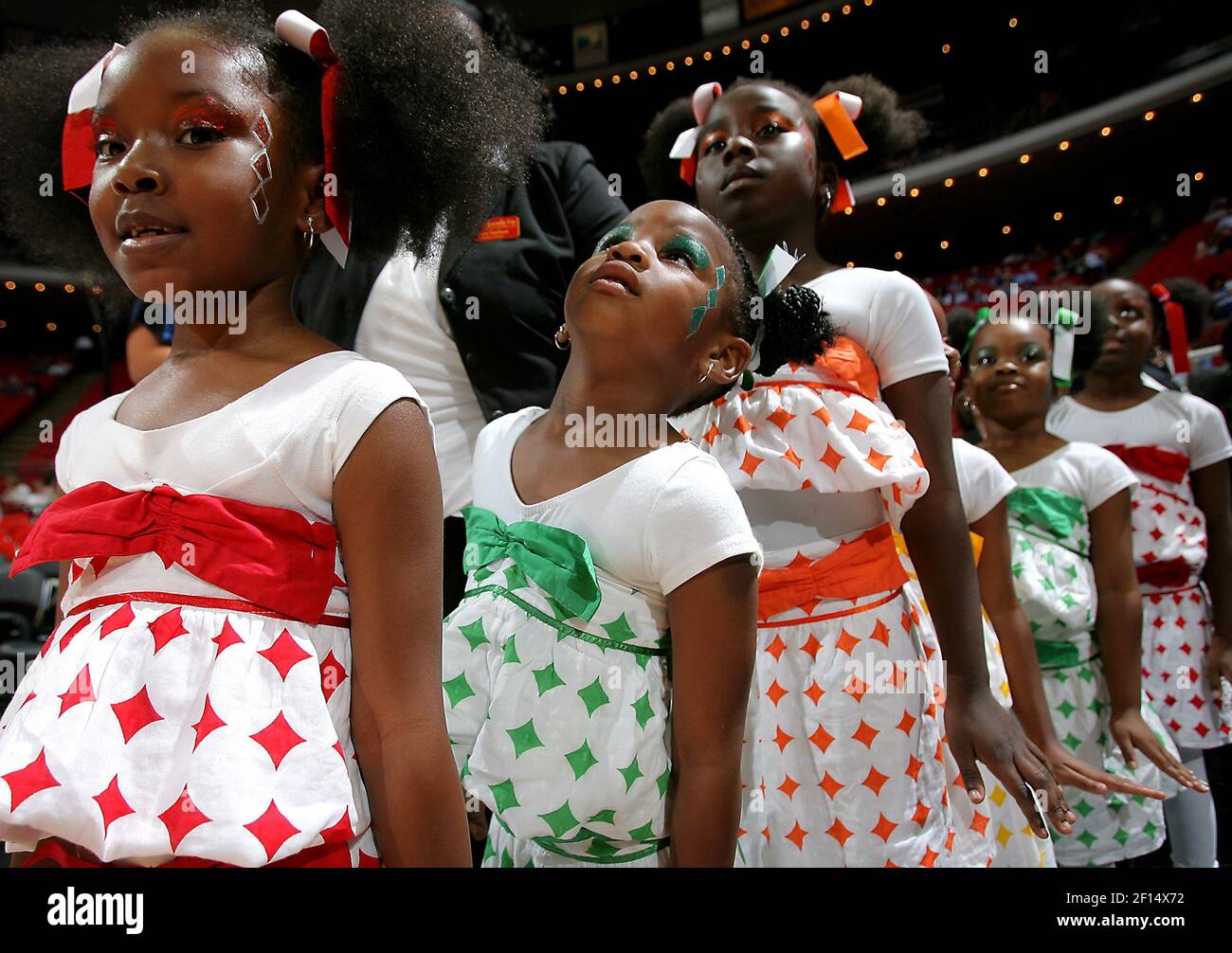 Kayla Moore, Asia Henderson and Kamiya Guy (left-right) wait in line ...