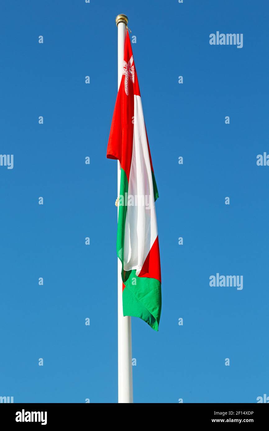 In oman waving flag Stock Photo - Alamy