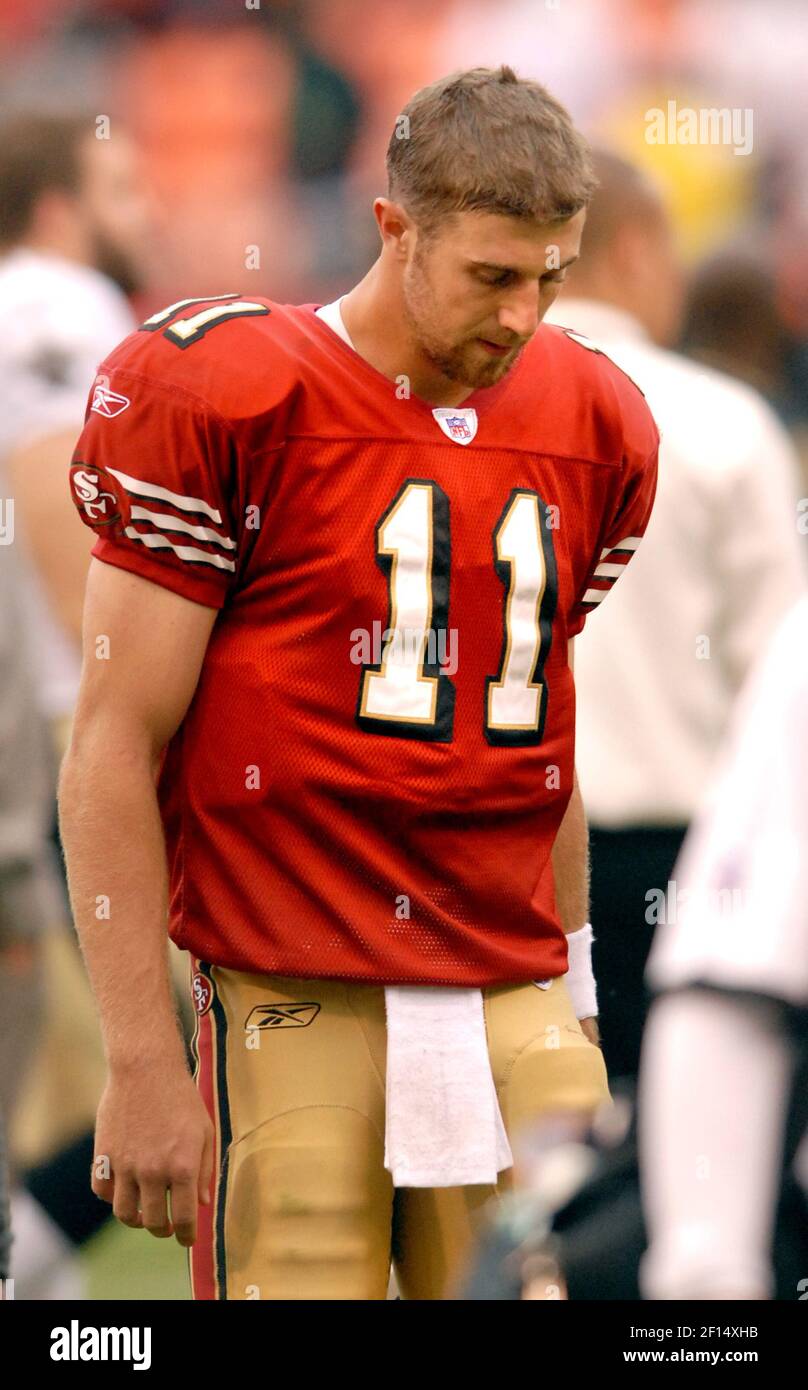 San Francisco 49ers quarterback Alex Smith walks off the field after a ...