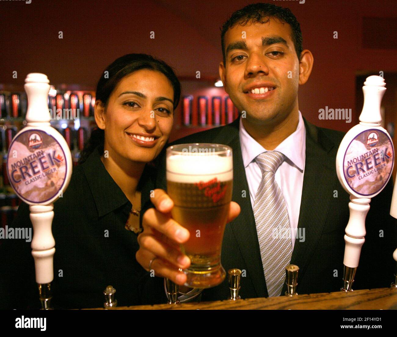 Minhas Craft Brewery owner Ravinder Minhas, right, stands with his ...