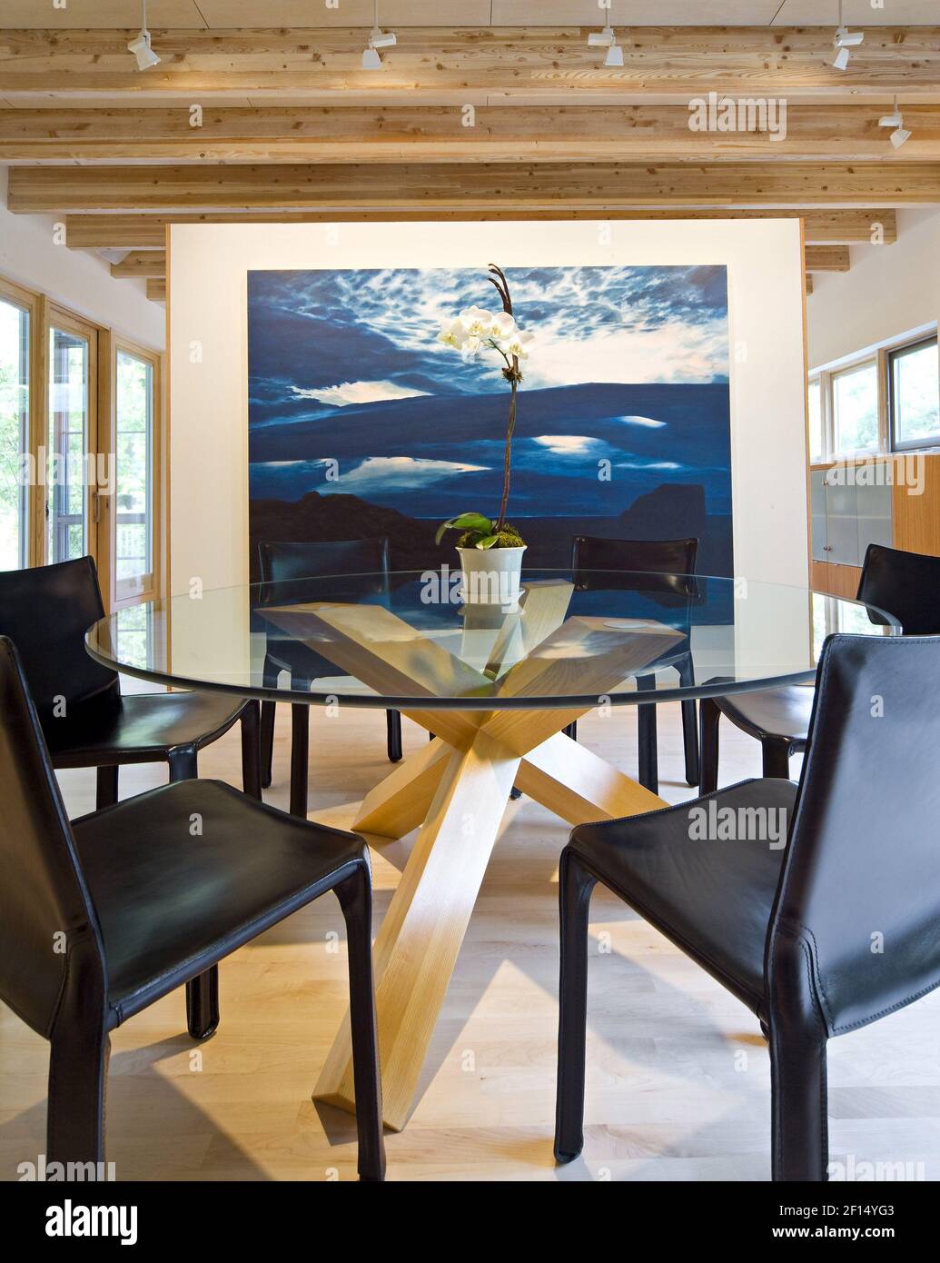 Fine (art) dining: A glass-topped Mario Bellini dining table from Scott ...